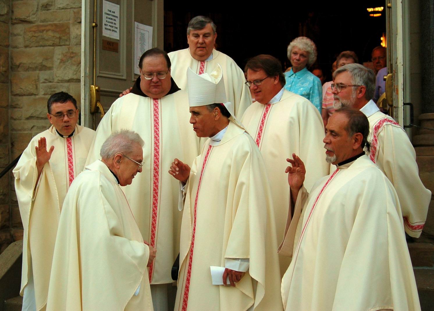Archbishop DiNardo and Fr. Henry