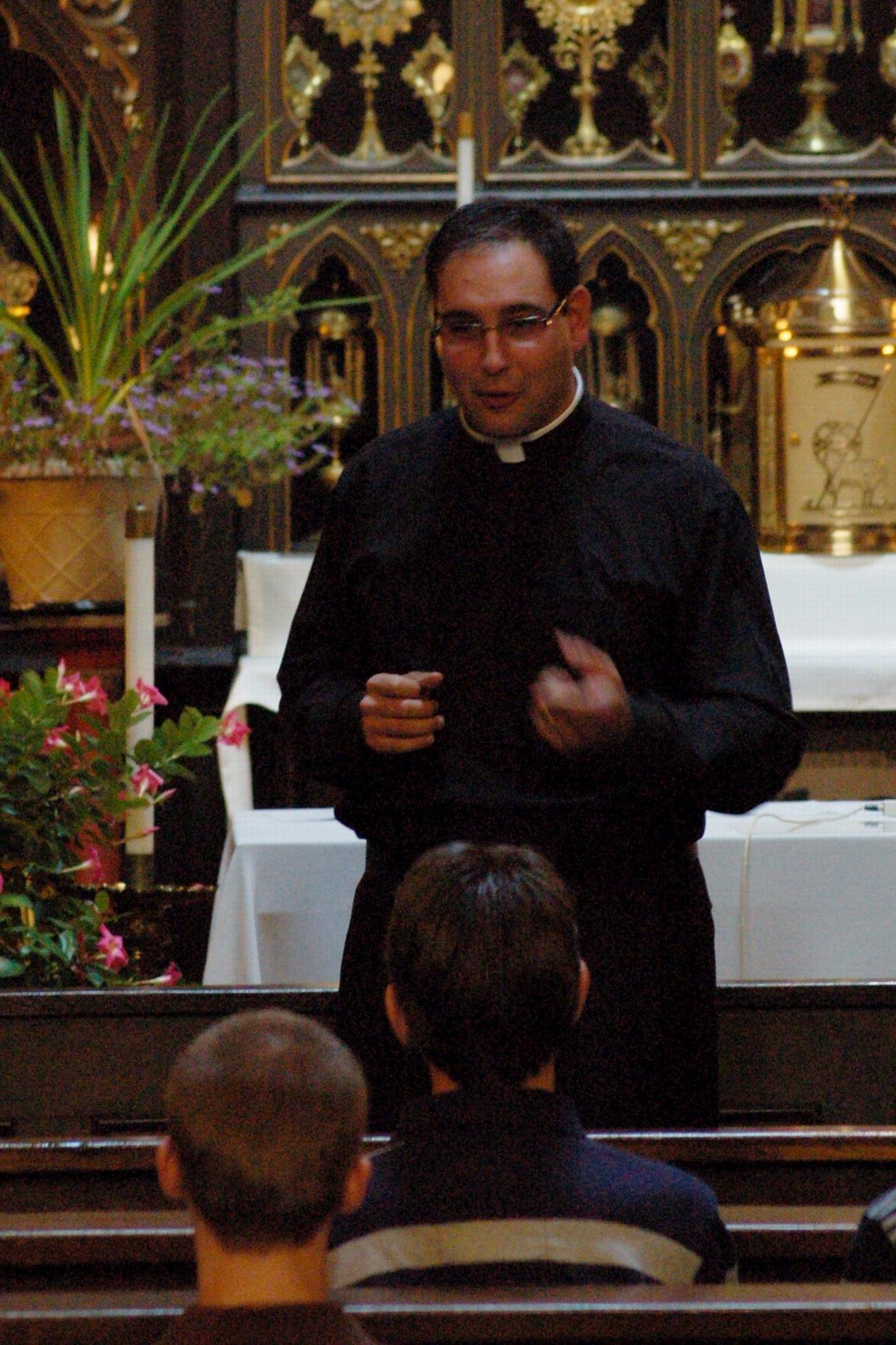 Fr. Dave Schorr spoke of his vocation and then began the tour of the ...